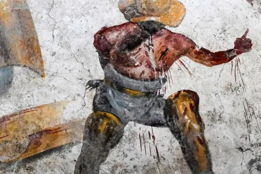 Grisly gladiator fresco discovered in tavern at Pompeii