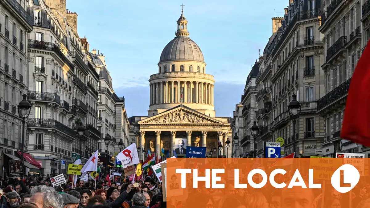Thousands march in France to back Iranian protesters