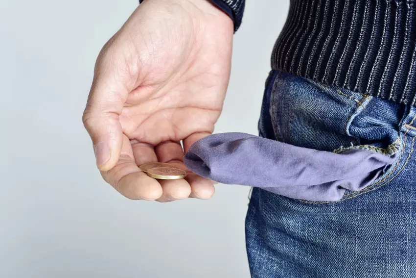 When will Germany's disputed unemployment benefit reform take effect?